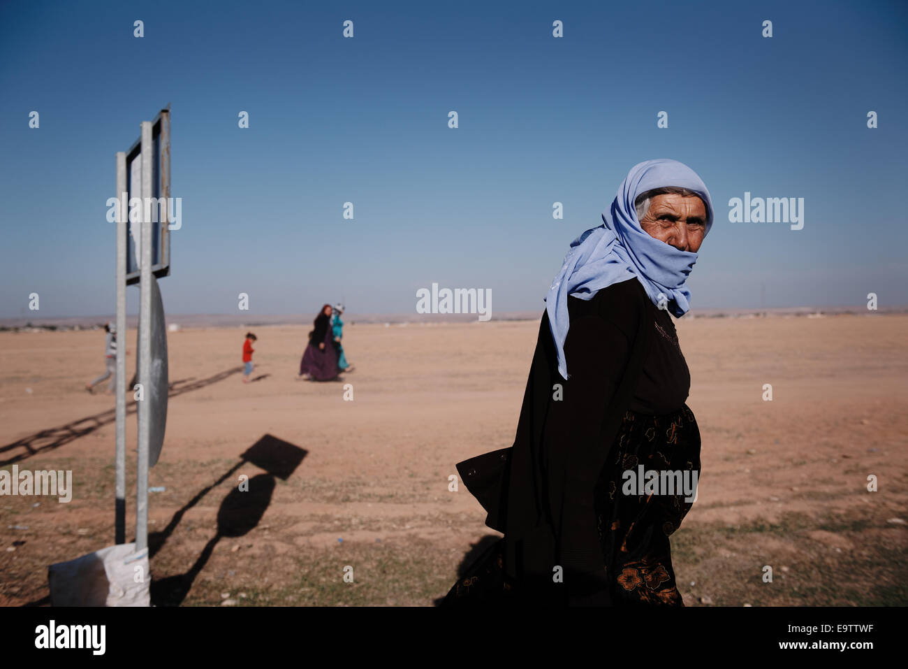 A Kurdish woman in the Turkish Syrian border before the funeral of a ...