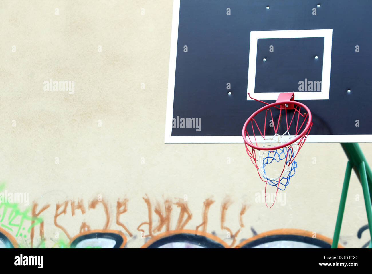 A close up of a broken basketball hoop at playground Stock Photo - Alamy