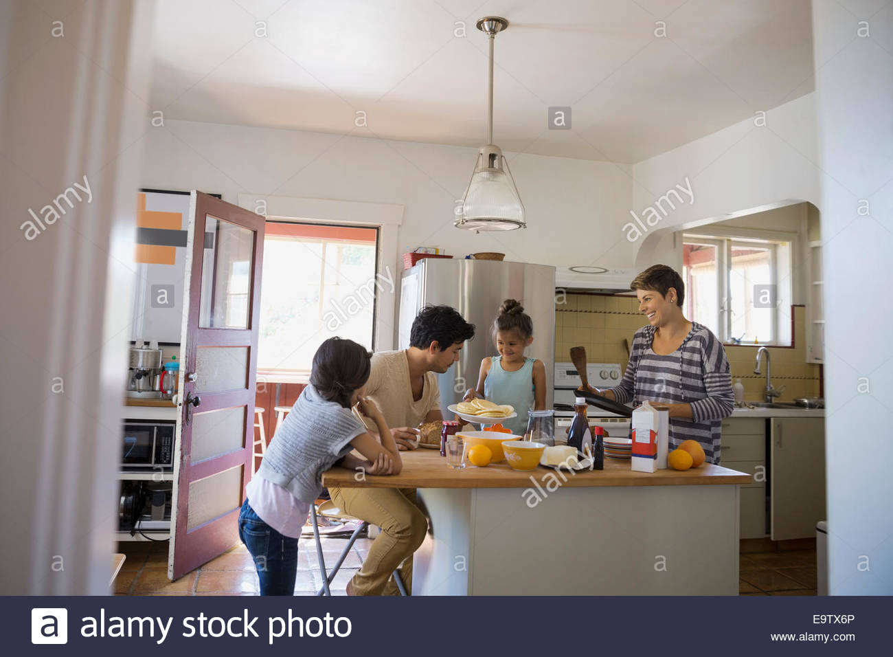 Multi ethnic family breakfast hi-res stock photography and images - Alamy