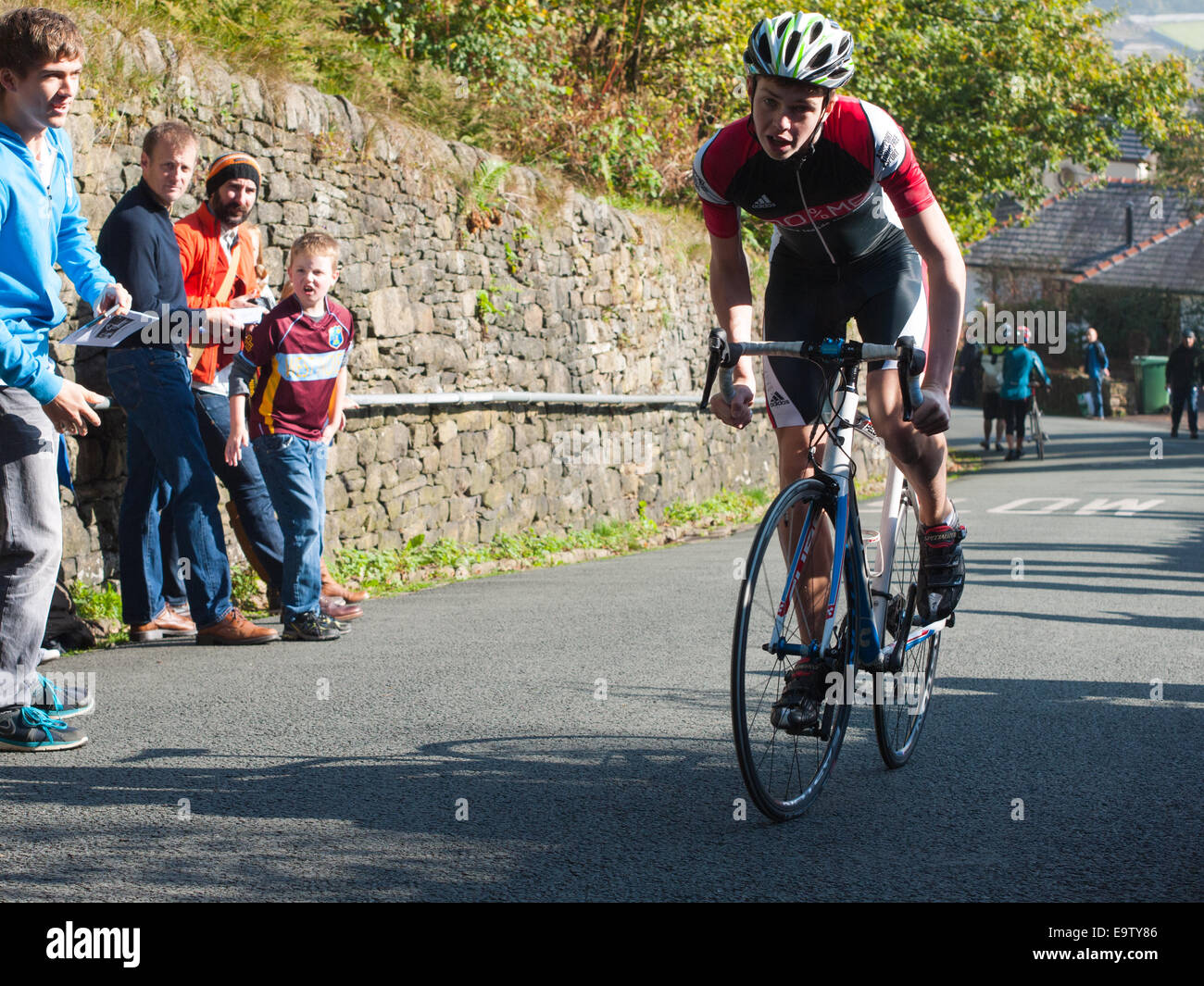 Cyclist in hill climbing race in Ramsbottom, Lancashire Stock Photo - Alamy