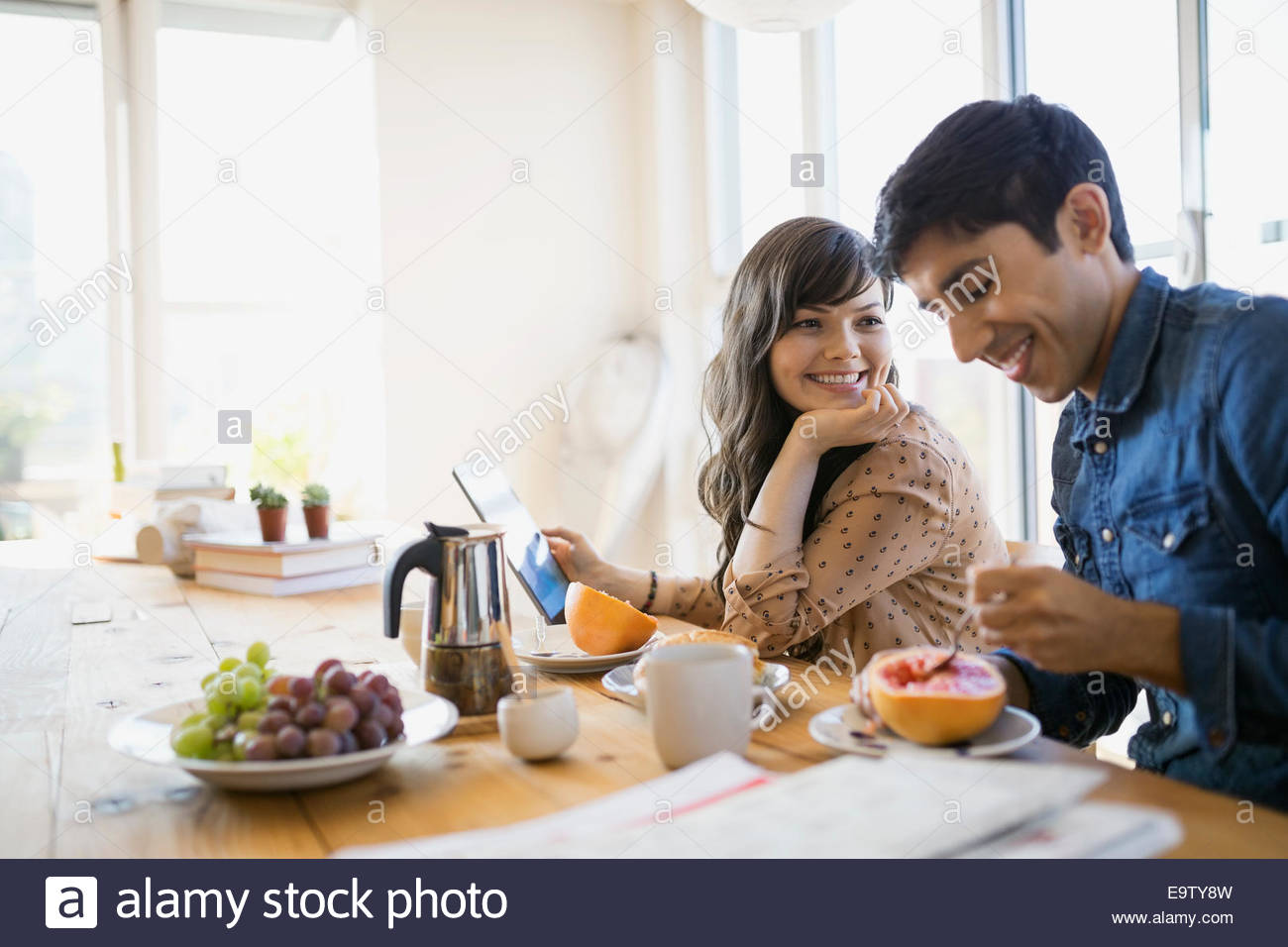 Indian couple dining table hi-res stock photography and images - Alamy