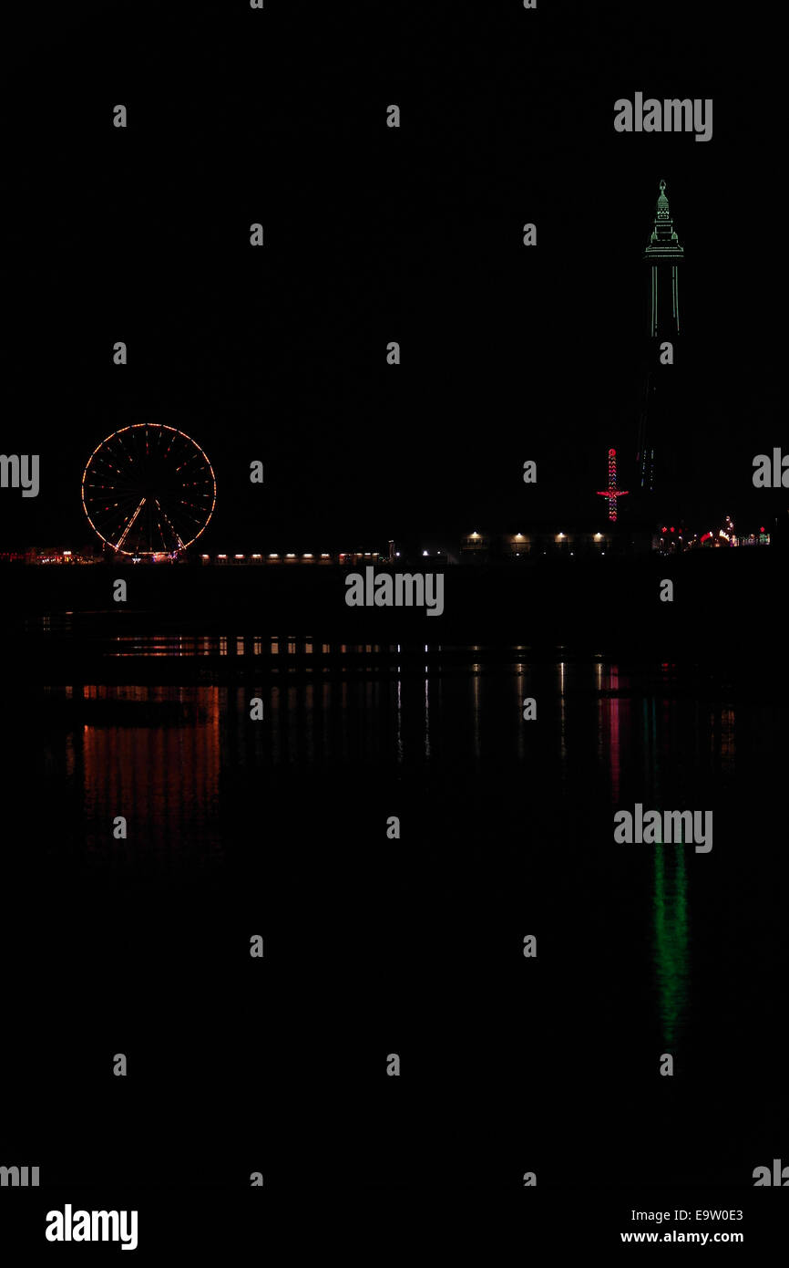 Blackpool tower red green colours illuminated standing rising centre ...