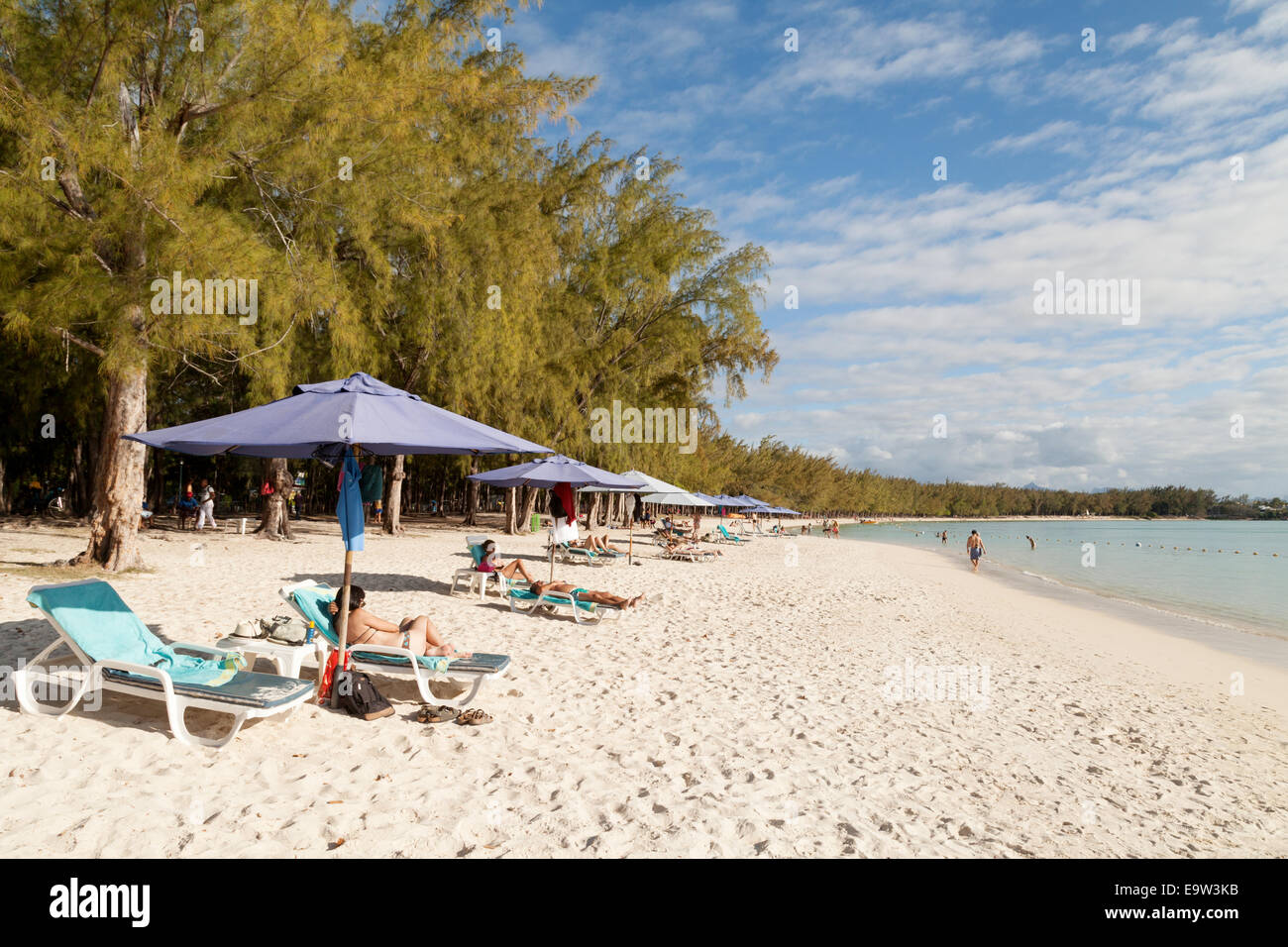 Mauritius beach; People sunbathing on Mont Choisy beach, north coast ...
