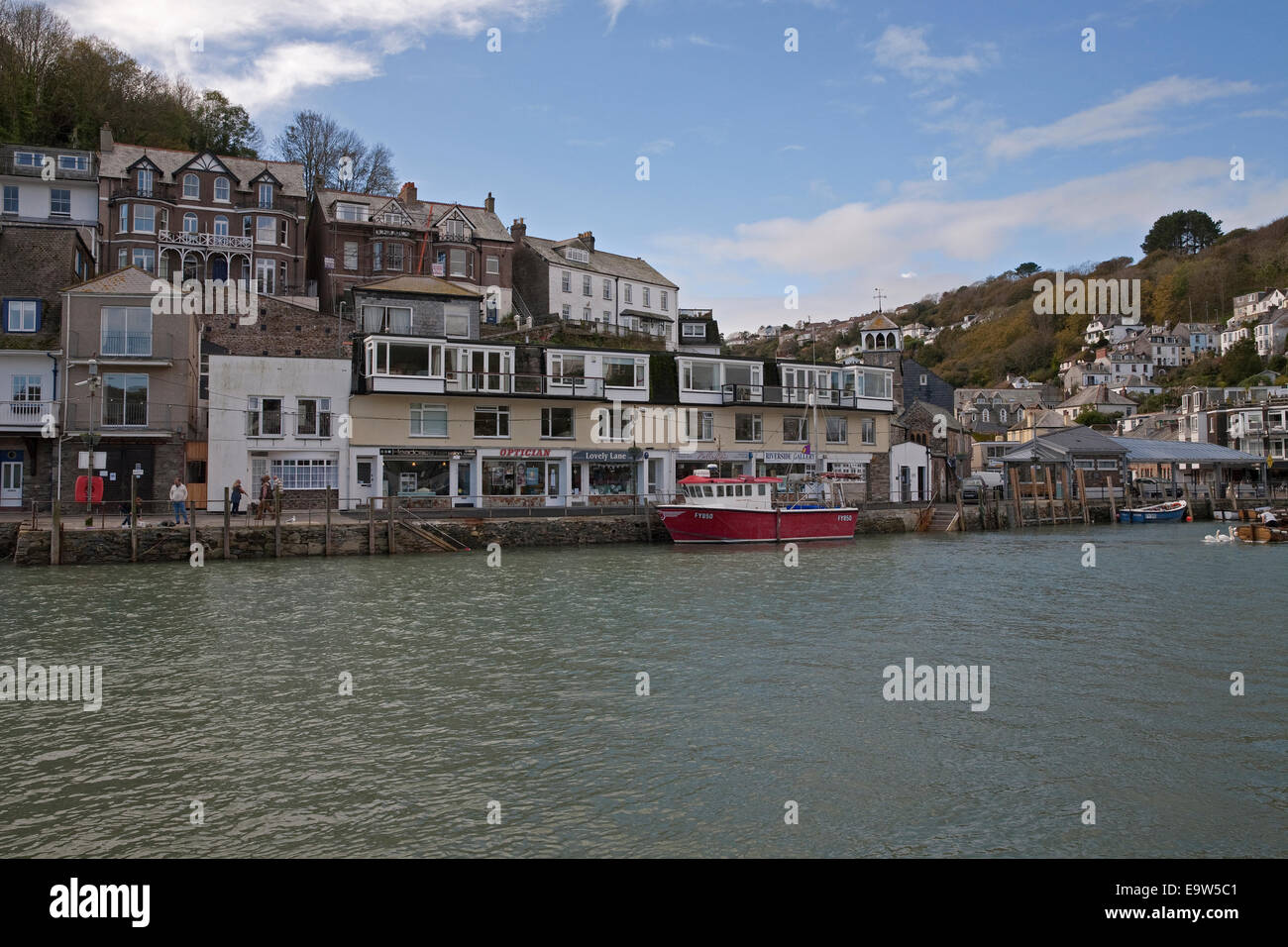 Blue skies over the harbour in Looe Cornwall Stock Photo - Alamy