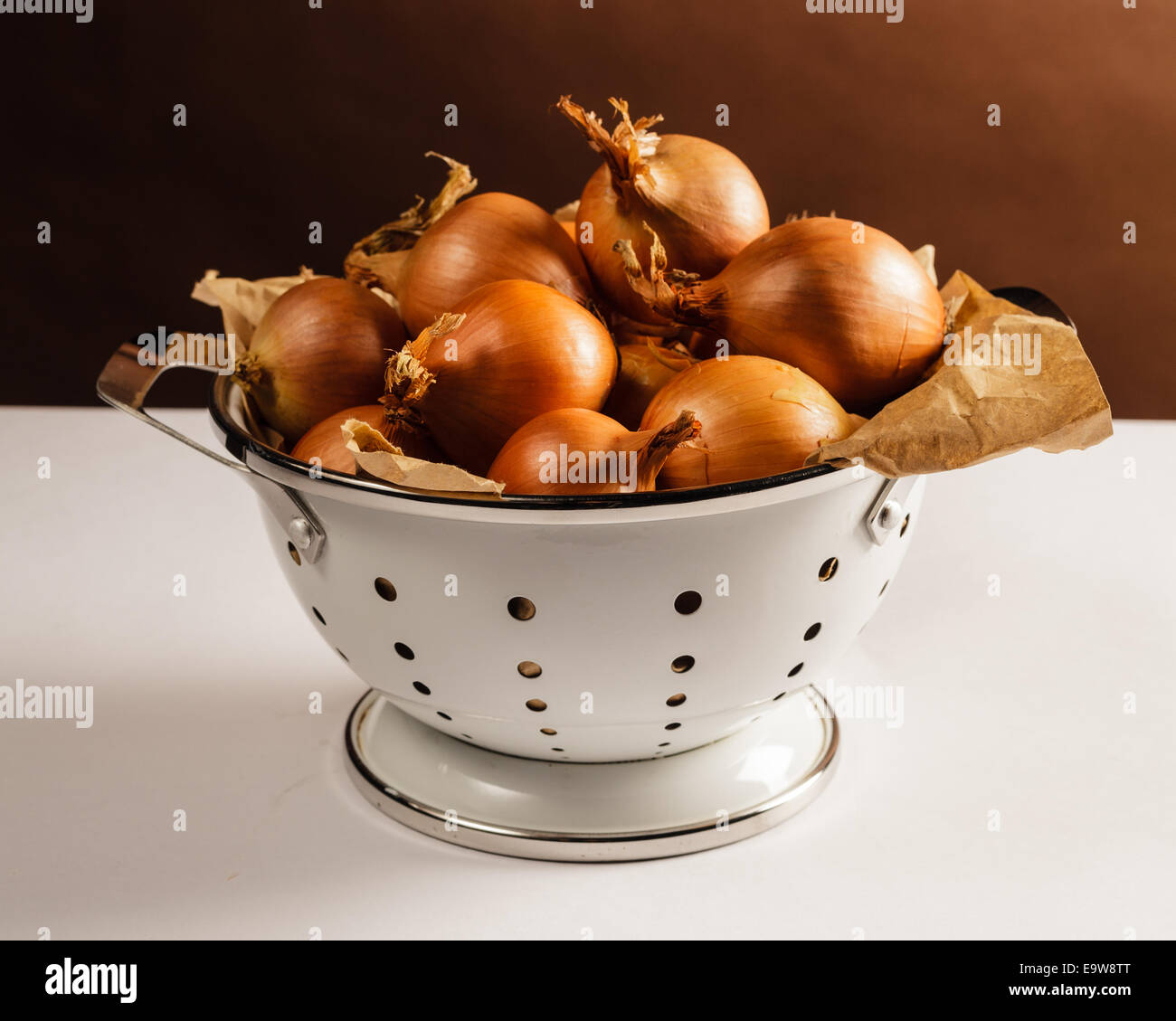 Golden colander hi-res stock photography and images - Alamy