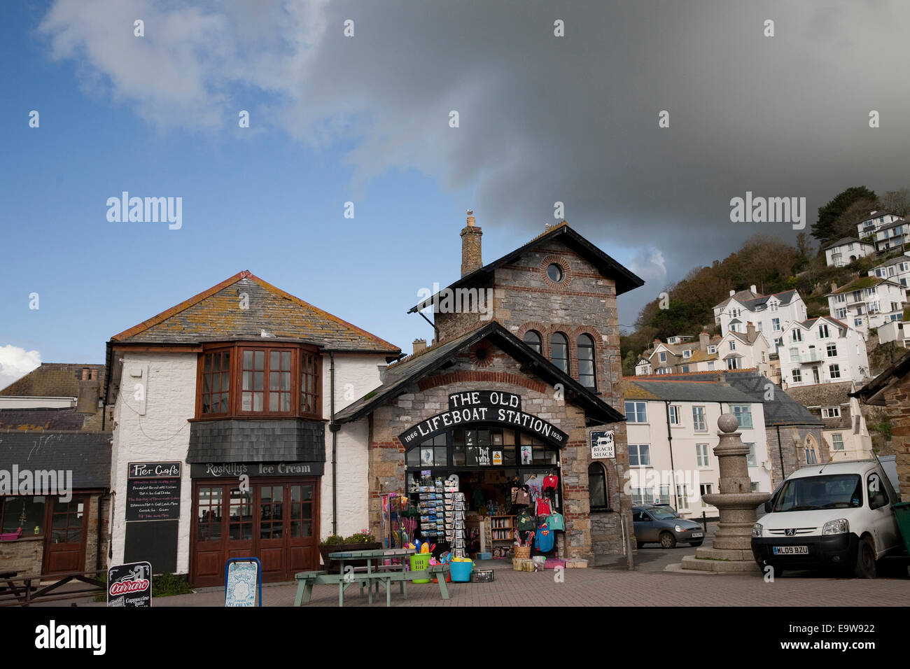 The old lifeboat station under a black cloud in Looe, Cornwall Stock ...