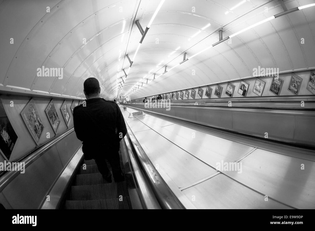 Passengers commuters on escalator hi-res stock photography and images ...