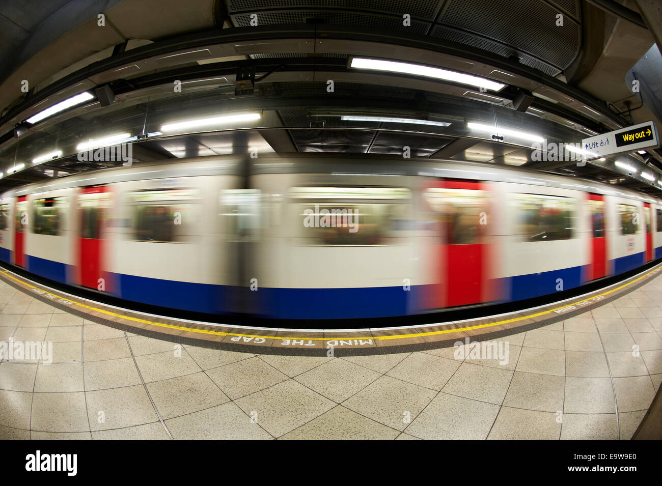 Train at London Underground driving through station Stock Photo - Alamy