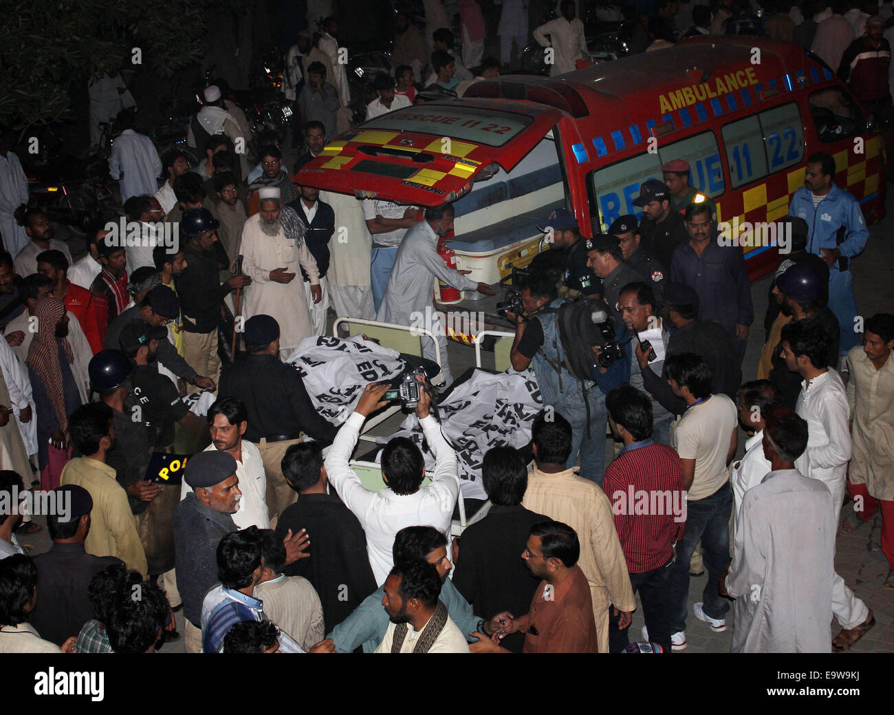 Pakistani relatives mourns over the death of their loved ones at a ...