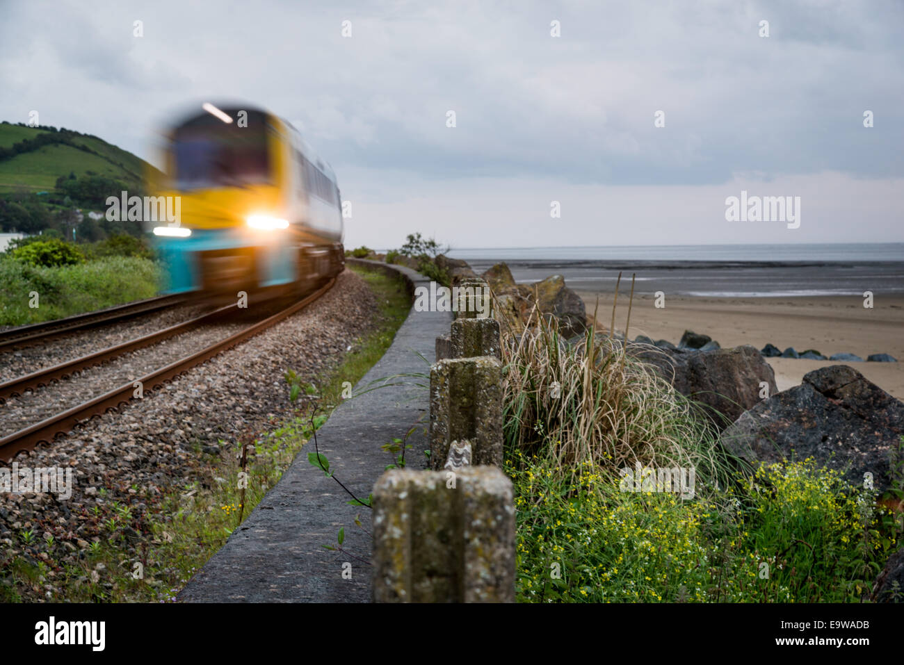 Arriva train approaching Ferryside Station on route to Carmarthen, west ...