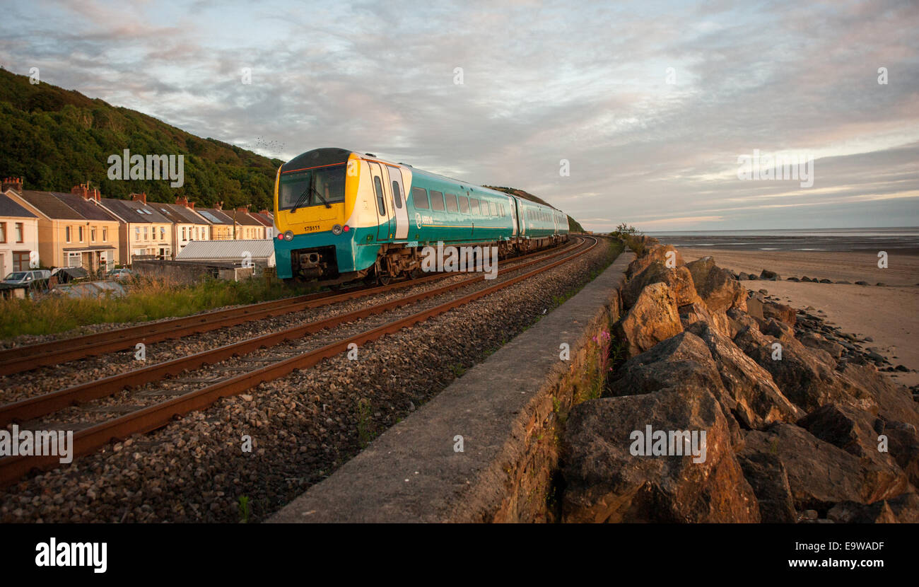 Arriva train approaching Ferryside Station on route to Carmarthen, west ...