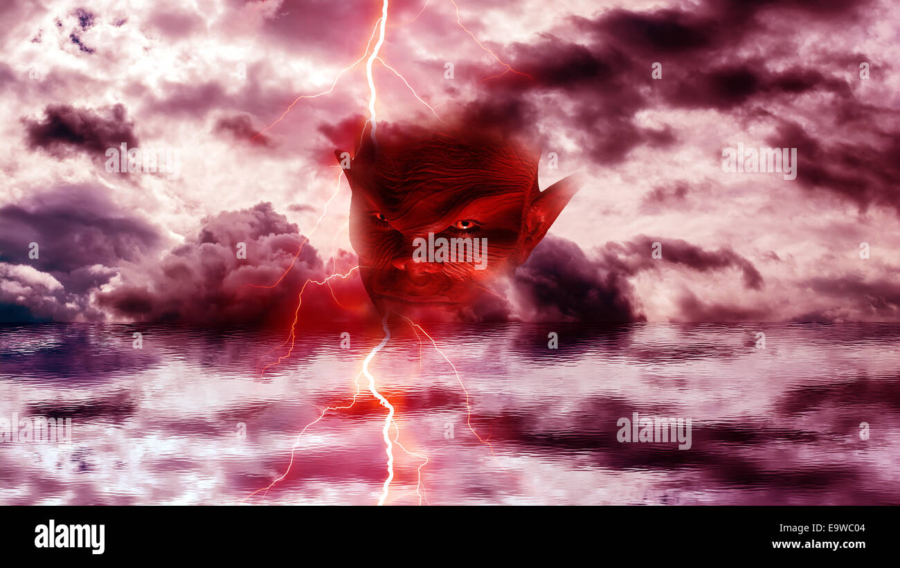 Devil's head over cloudy sky and ocean hell Stock Photo - Alamy
