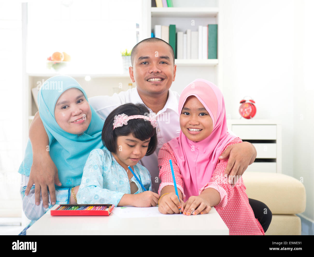 Indonesian muslim family learning together hi-res stock photography and ... Indonesian muslim family learning together hi-res stock photography and ...