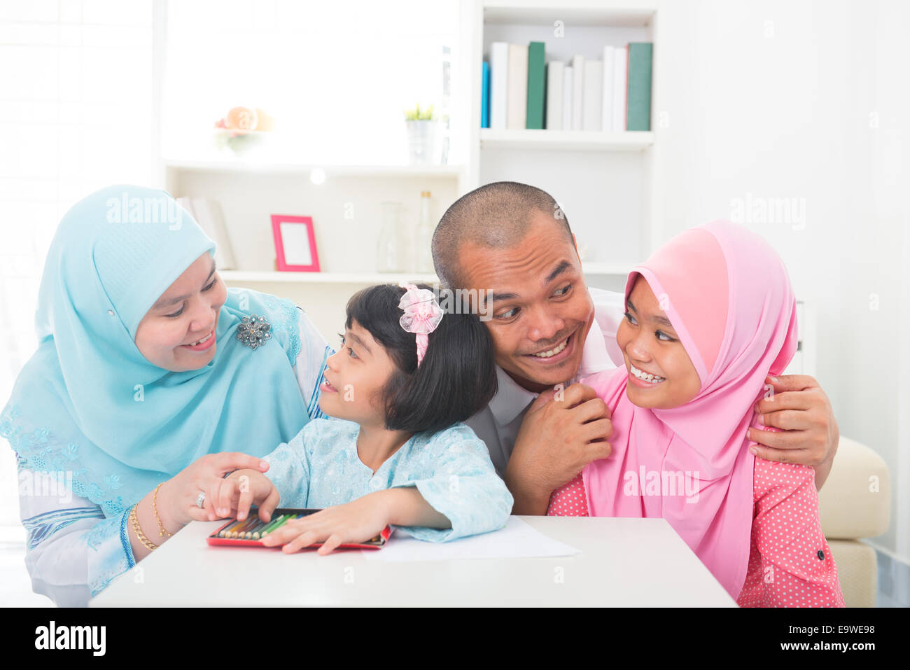 Indonesian muslim family learning together hi-res stock photography and ... Indonesian muslim family learning together hi-res stock photography and ...