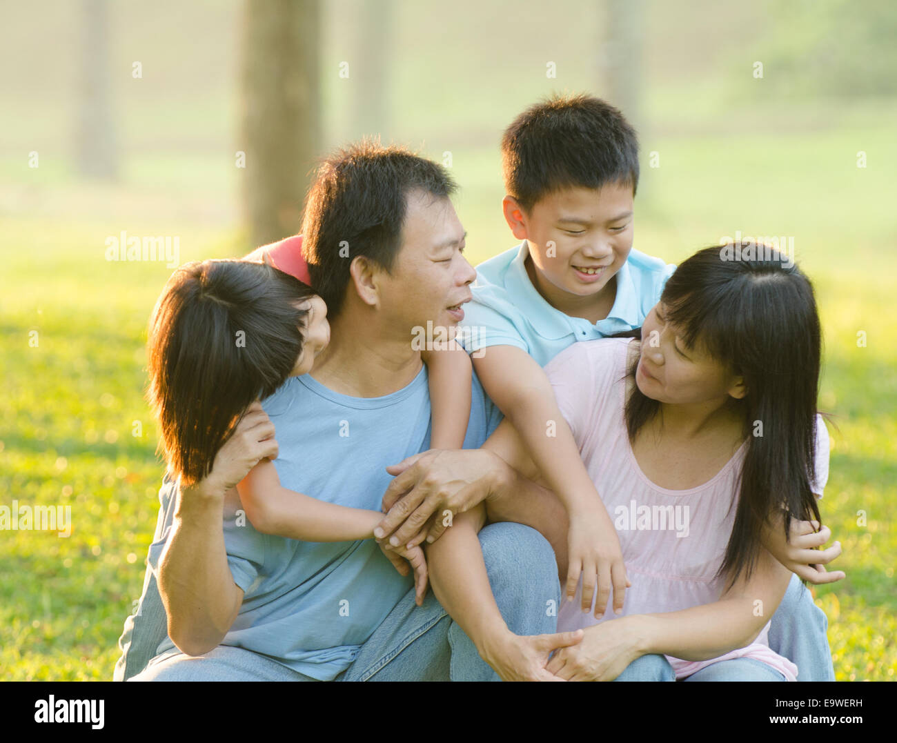 asian family enjoying outdoor at the park Stock Photo - Alamy