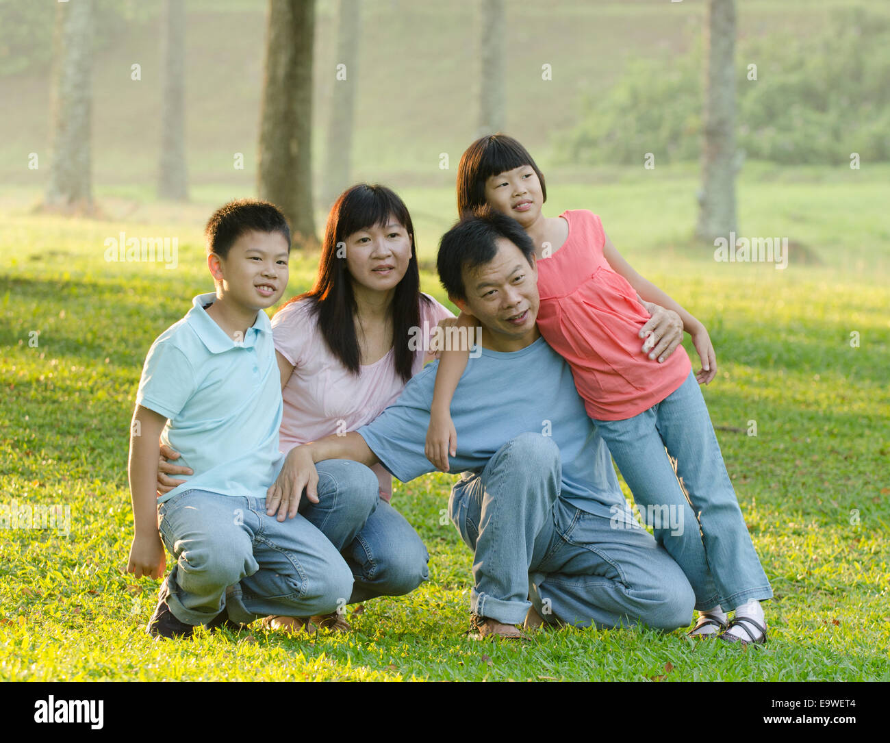 asian family enjoying outdoor at the park Stock Photo - Alamy