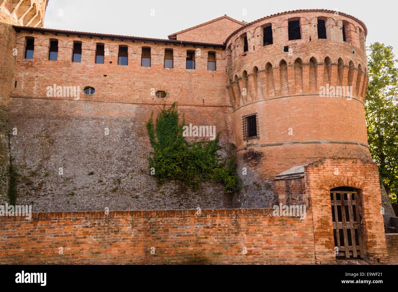 The medieval brick walls of the small village of Dozza near Bologna in ...