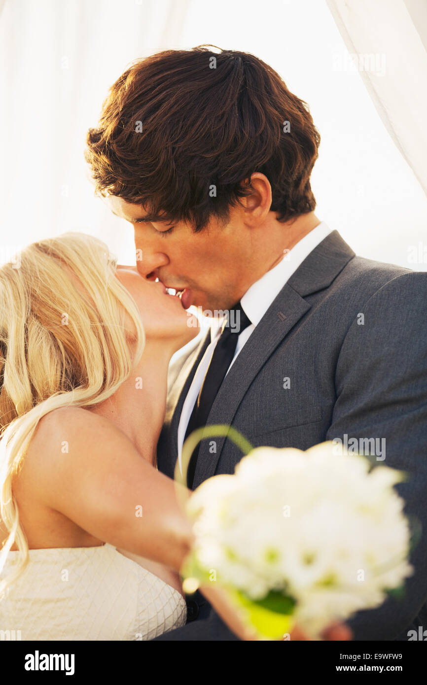 Wedding, Beautiful Romantic Bride and Groom Kissing and Embracing at ...