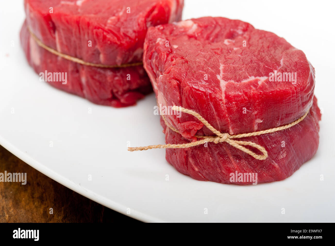 fresh raw beef filet mignon cut ready to cook Stock Photo - Alamy