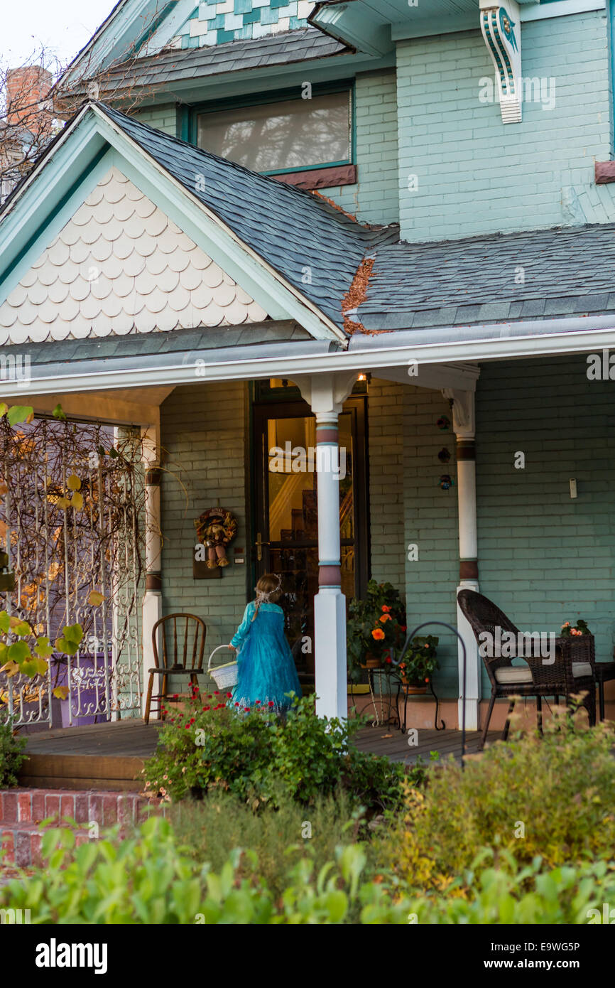 Trick or treating in costumes on Halloween night Stock Photo - Alamy