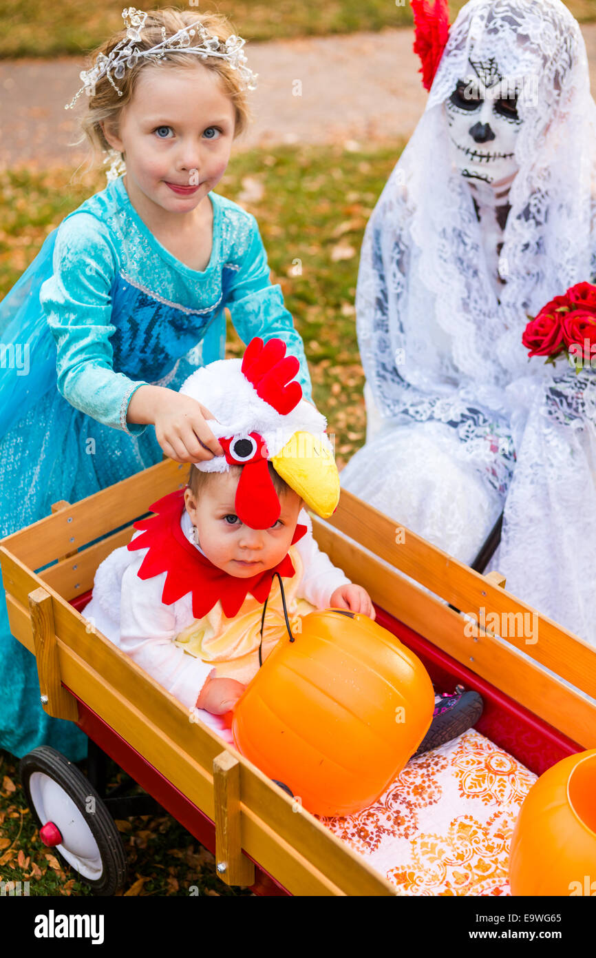 Trick or treating in costumes on Halloween night Stock Photo - Alamy