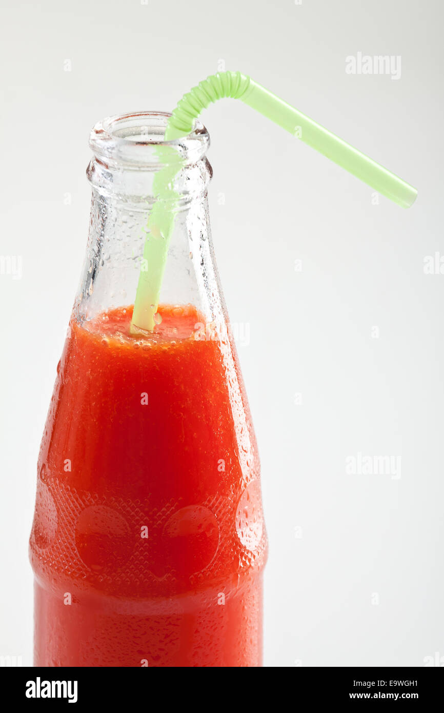 Blood orange bottle with crown cork Stock Photo - Alamy