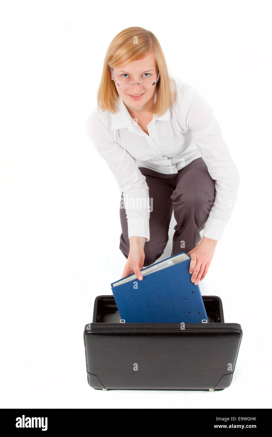 Young woman with briefcase and folders Stock Photo - Alamy