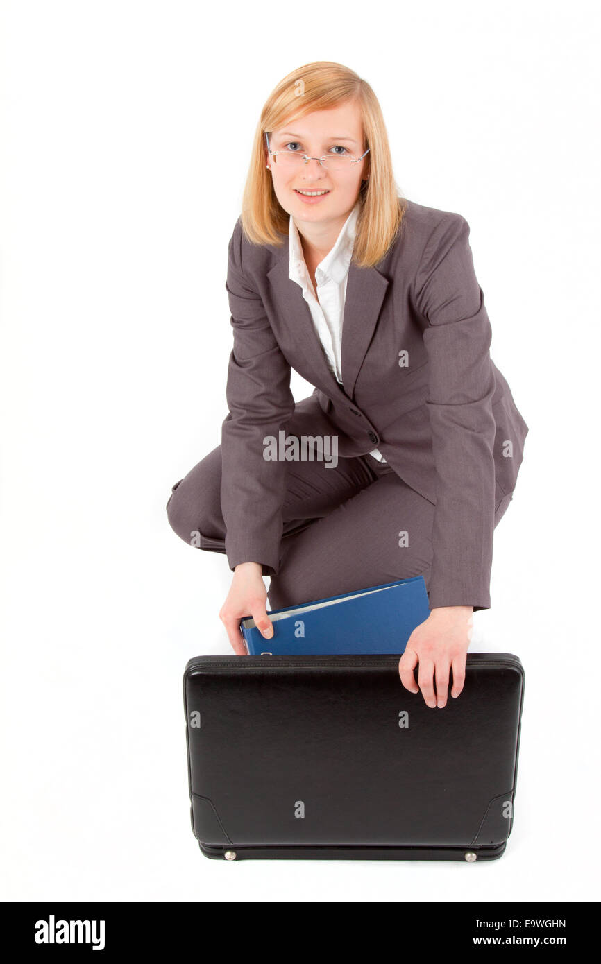 Young woman with briefcase and folders Stock Photo - Alamy
