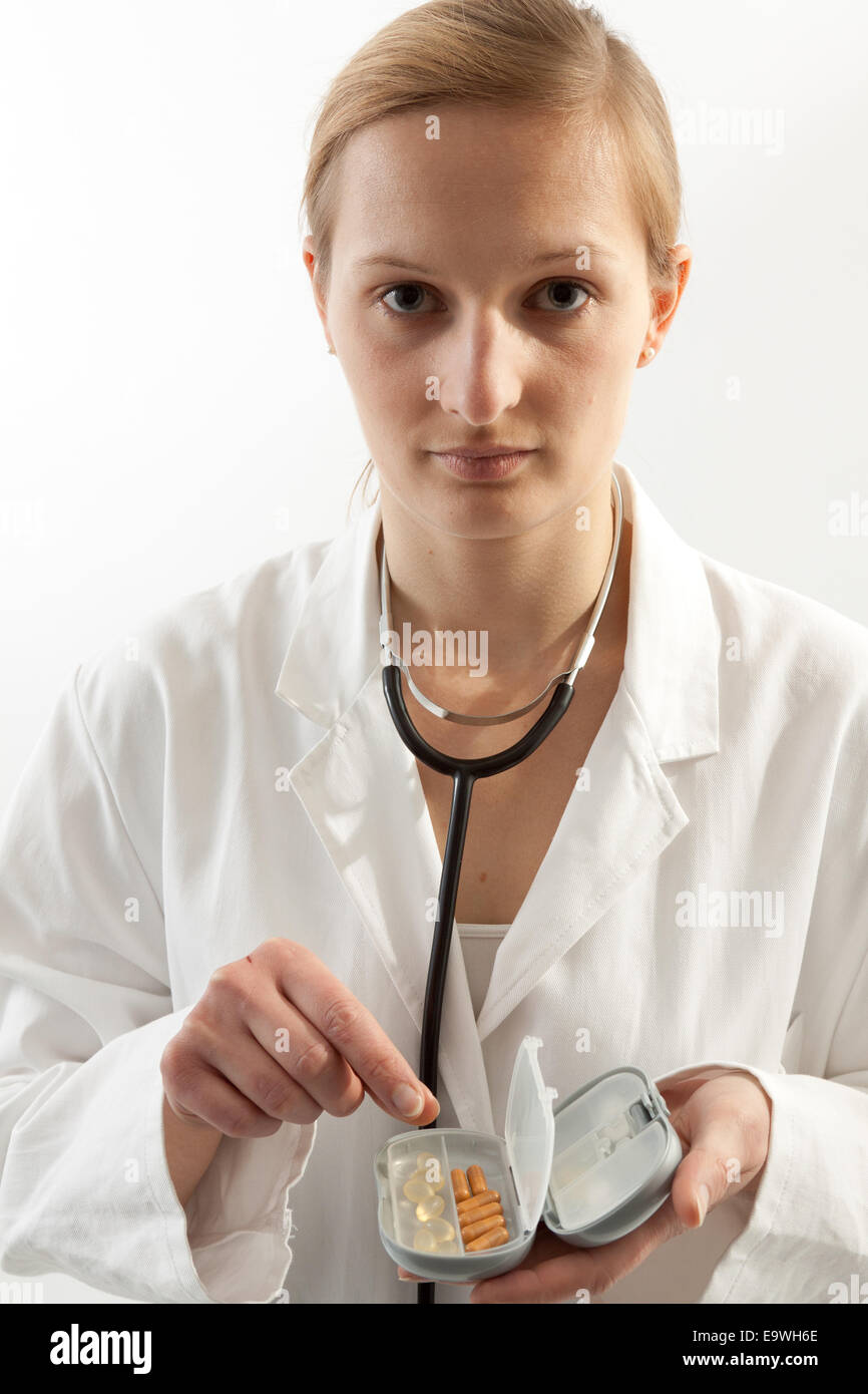 Female doctor or nurse with tablets Stock Photo - Alamy