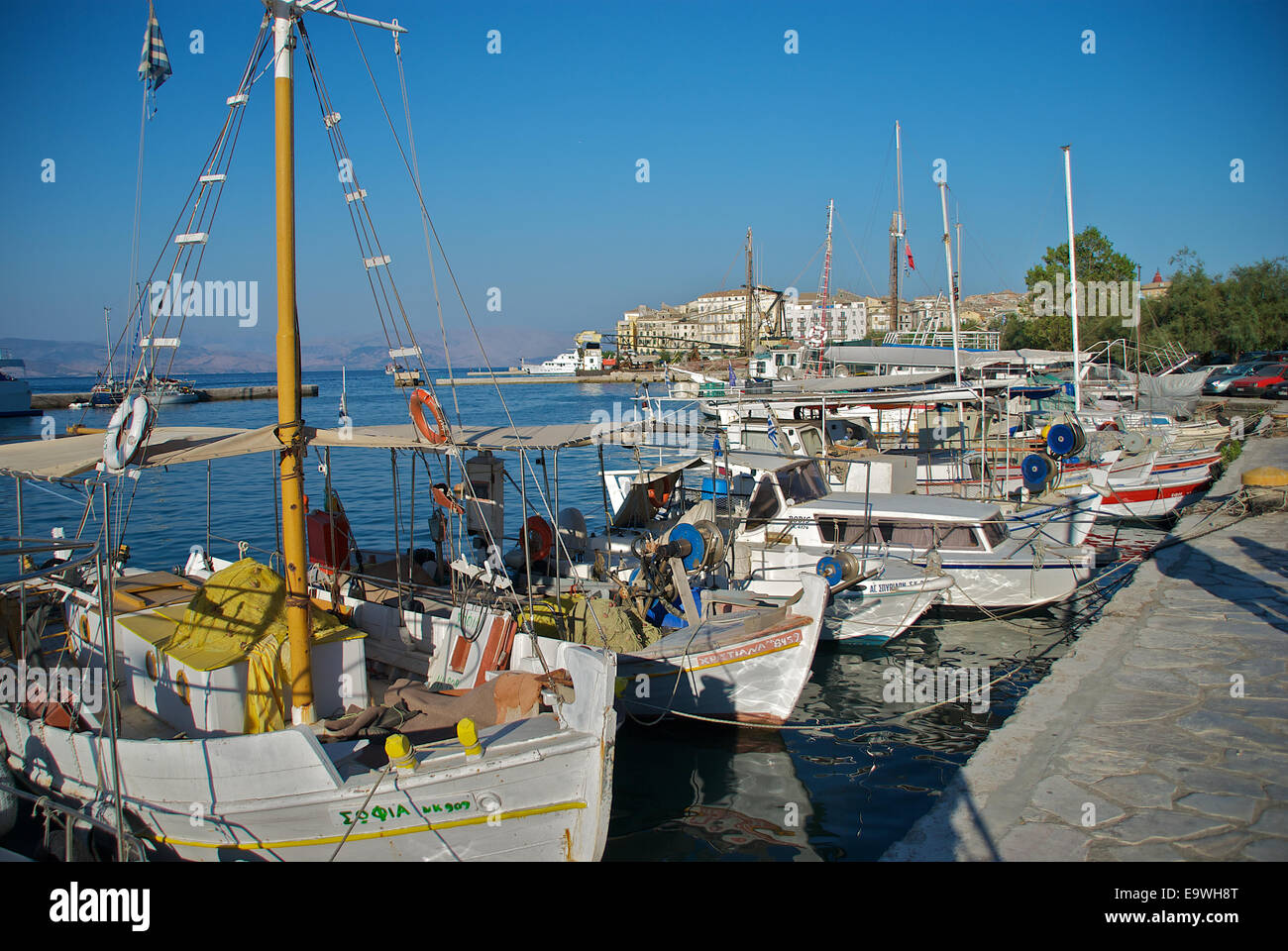 Small fishing boats in the harbor Stock Photo - Alamy