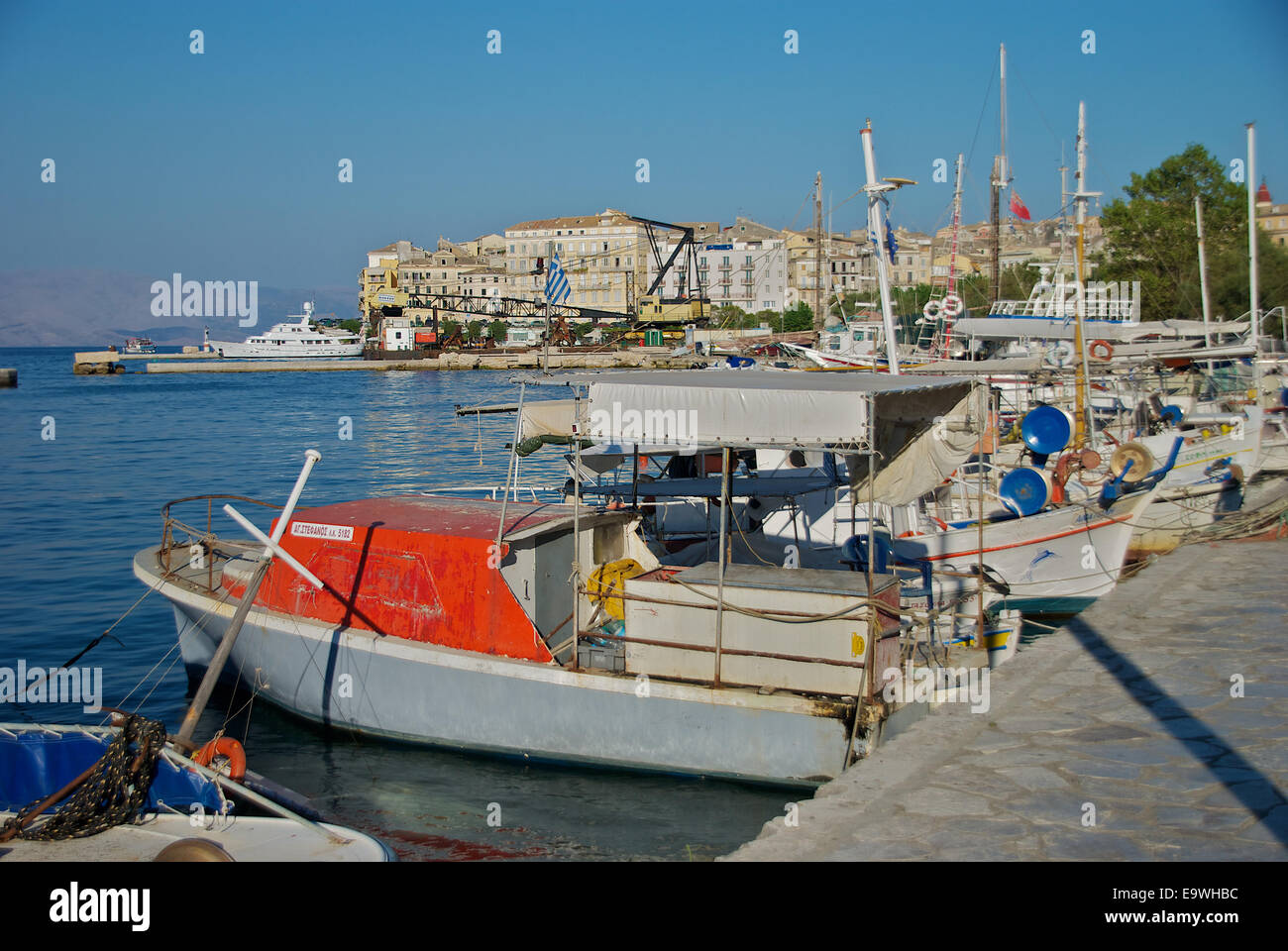 Small fishing boats in the harbor Stock Photo - Alamy