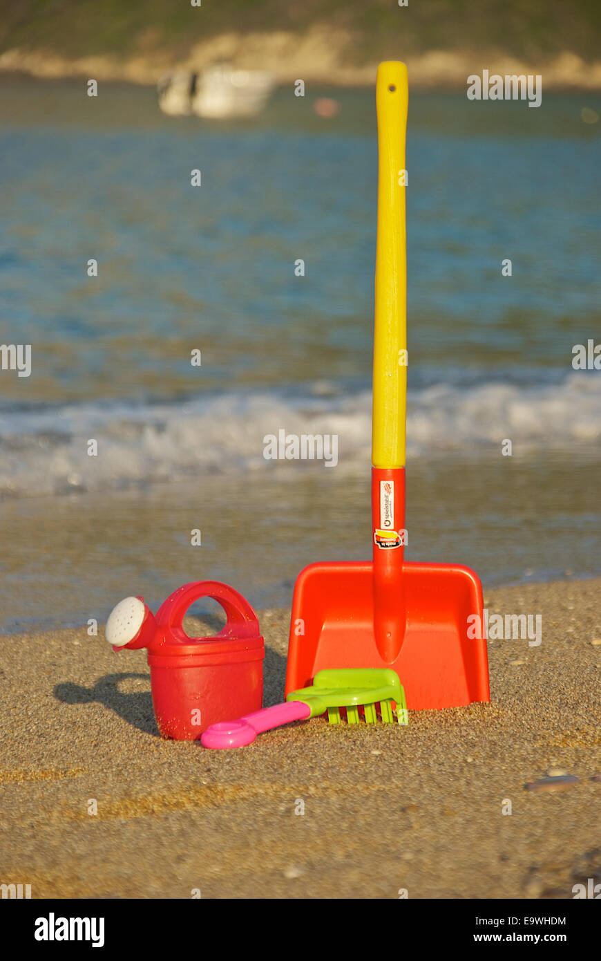 Sand toys on the beach Stock Photo - Alamy