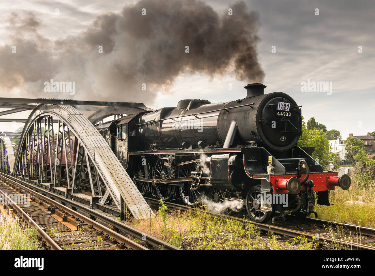 Steam engine train (LMS Class 5MT 4-6-0 no 44932) traveling across ...
