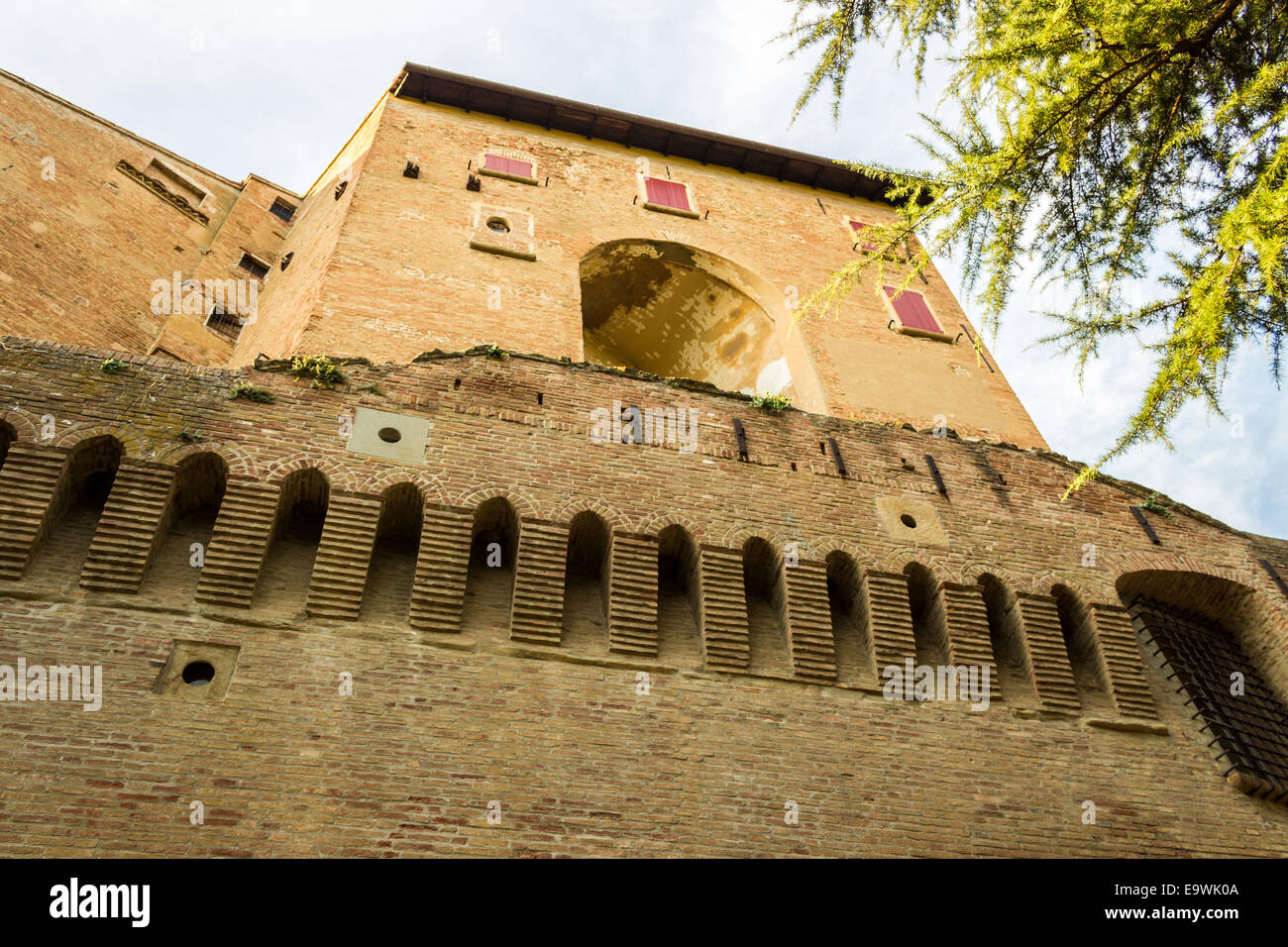 The medieval brick walls of the small village of Dozza near Bologna in ...