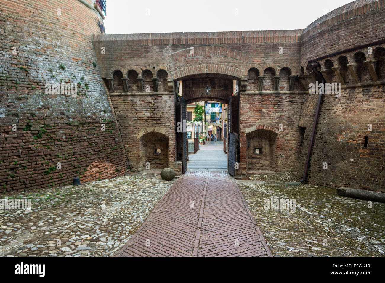 The medieval brick walls of the small village of Dozza near Bologna in ...