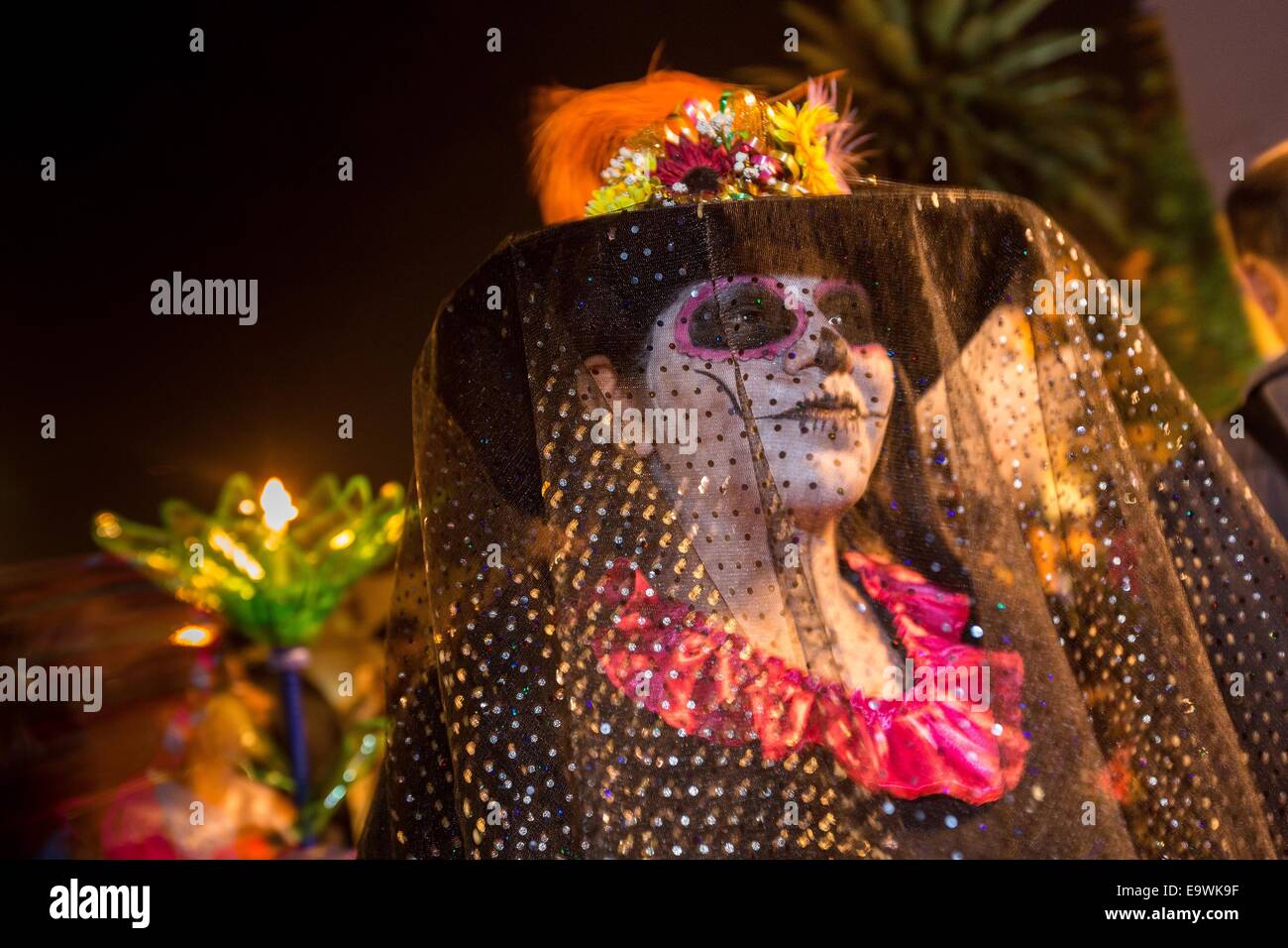 Oaxaca, Mexico. 29th Oct, 2014. A woman dressed as Catrina, the bride ...