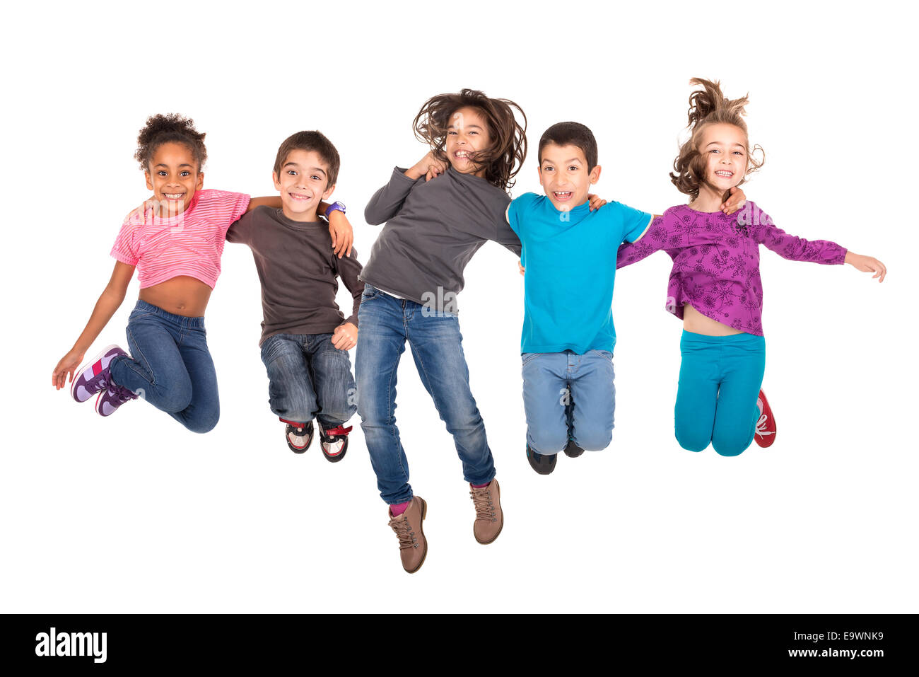 Group of children jumping isolated in white Stock Photo - Alamy