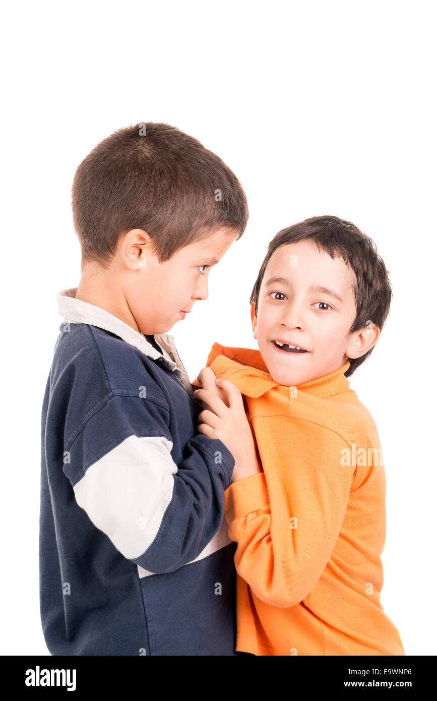 Bigger boy bullying a smaller one isolated in white Stock Photo - Alamy
