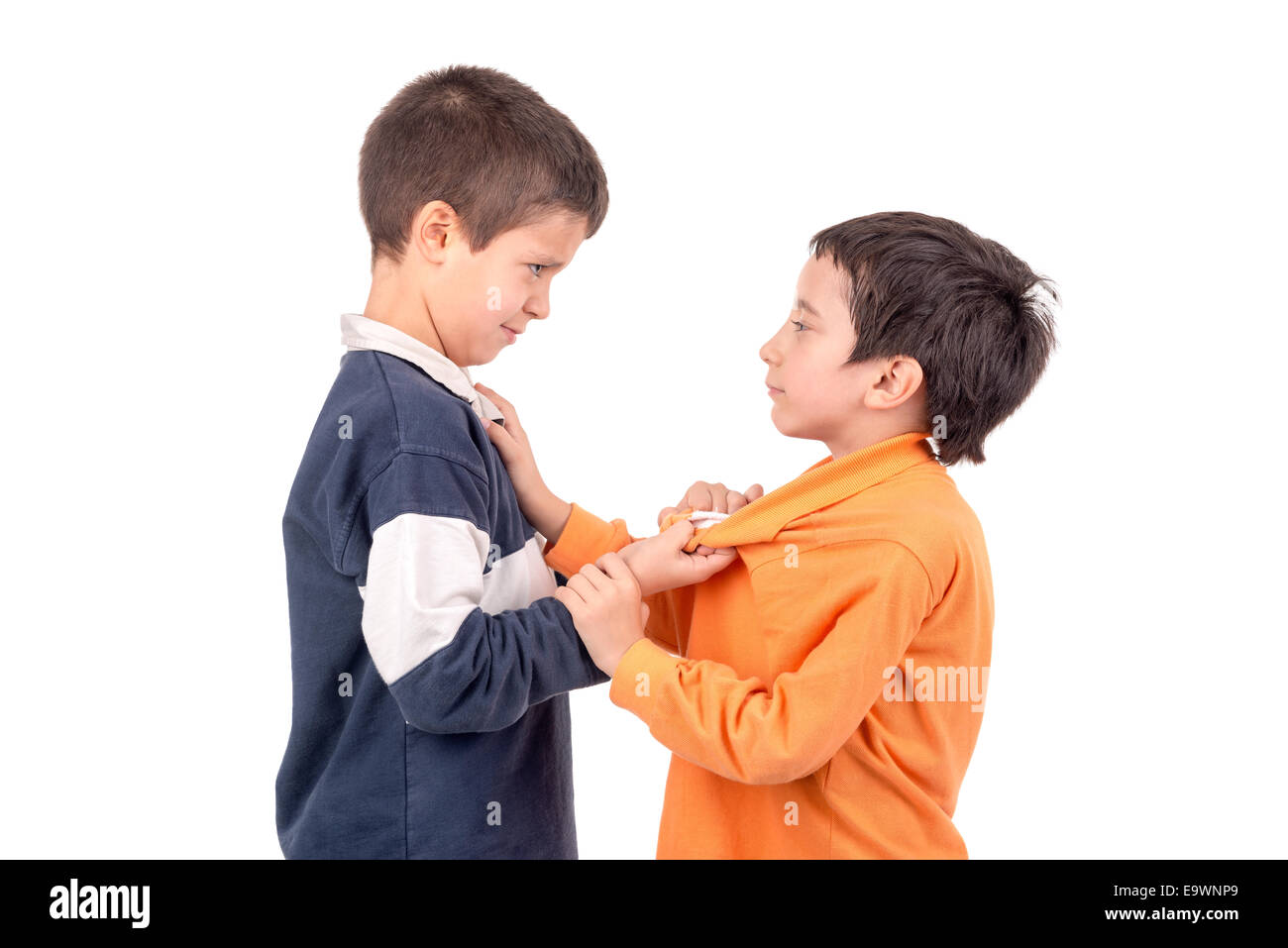 Bigger boy bullying a smaller one isolated in white Stock Photo - Alamy