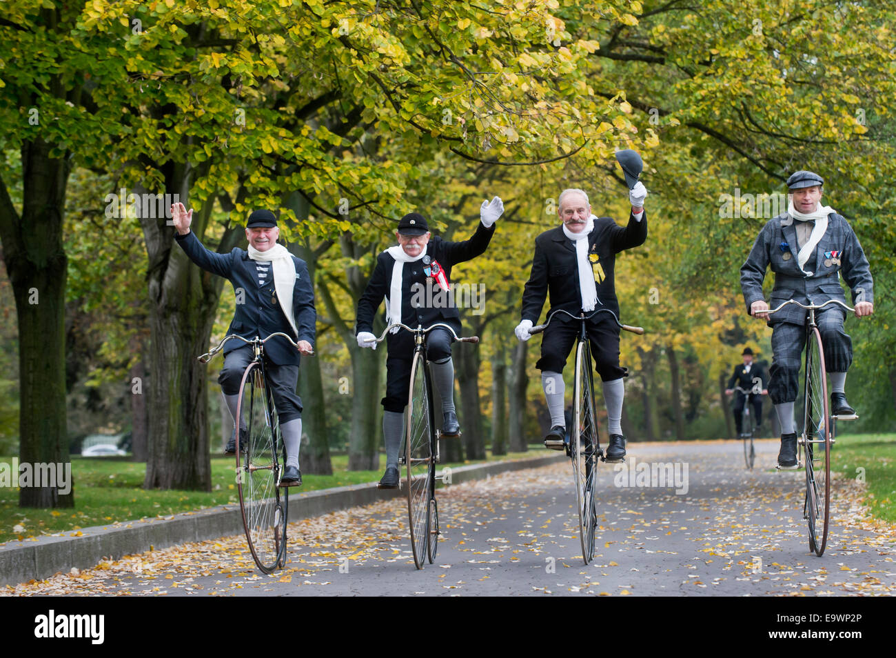 Velocipedists, men on historic bikes and in period costumes, pictured ...
