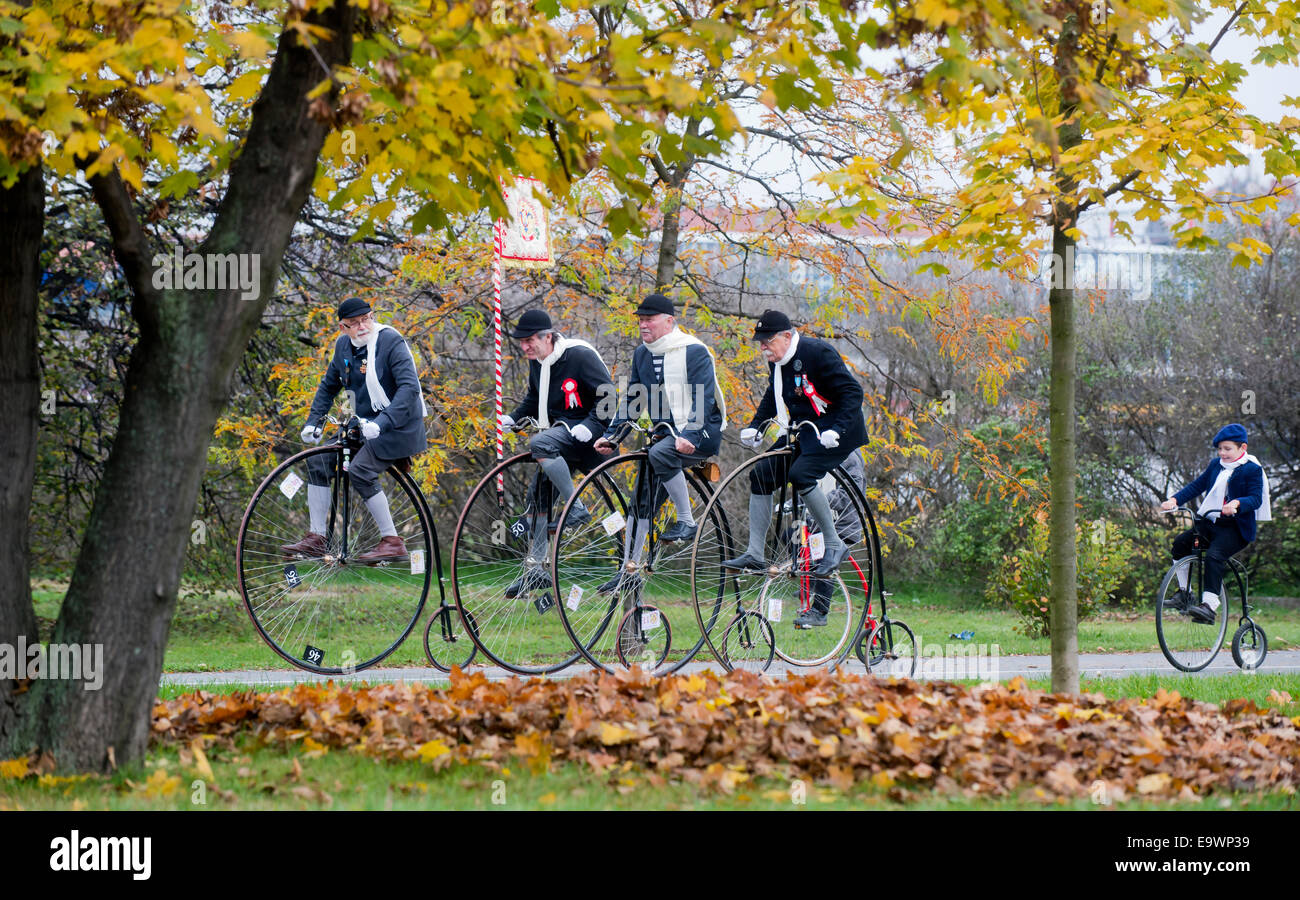 Velocipedists, men on historic bikes and in period costumes, pictured ...