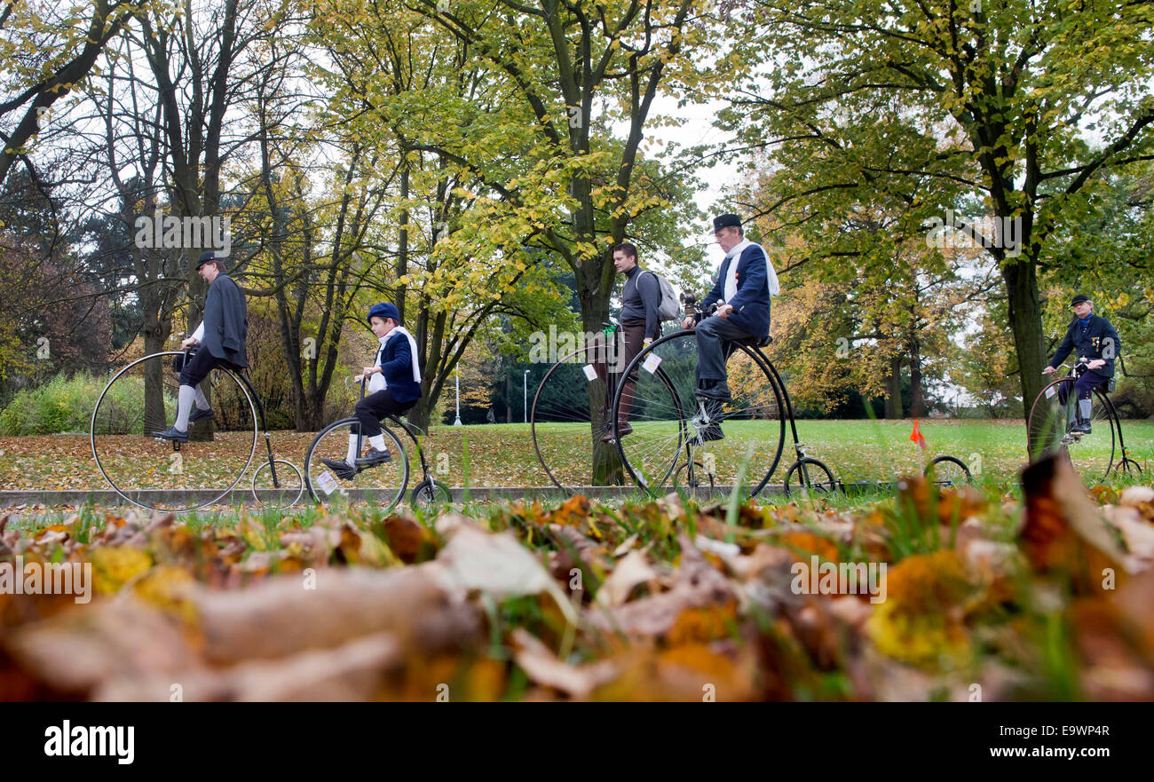 Velocipedists, men on historic bikes and in period costumes, pictured ...