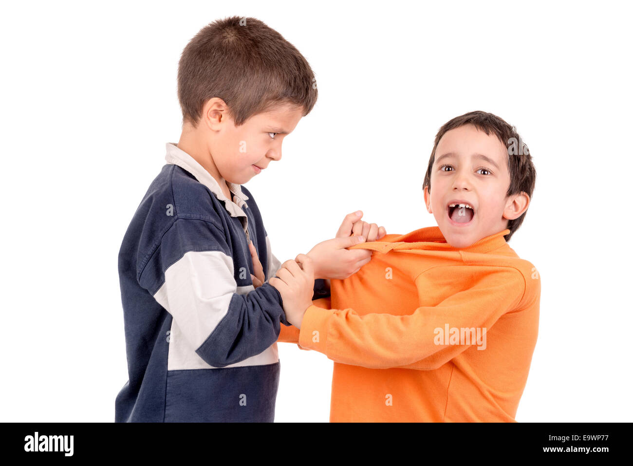Bigger boy bullying a smaller one isolated in white Stock Photo - Alamy
