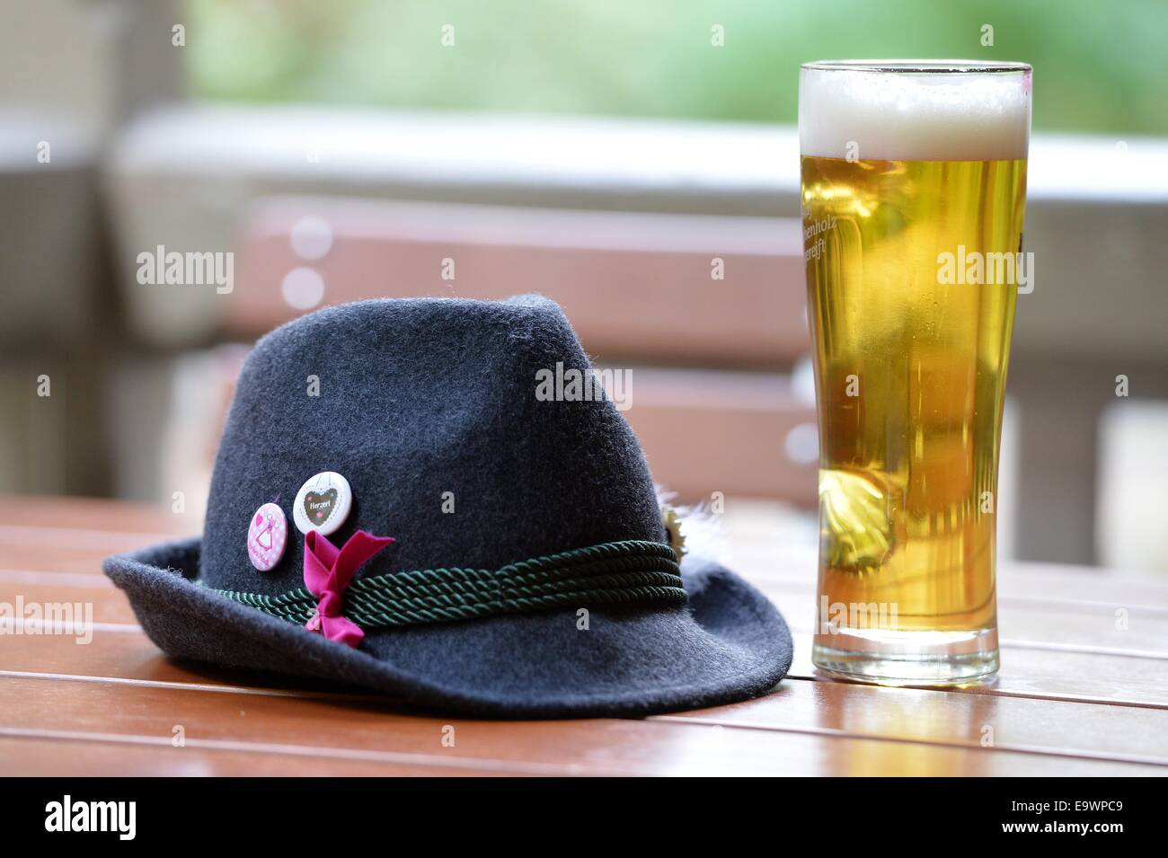 Beer in a glas with a typical bavarian hut, Germany, 17. October 2014 ...