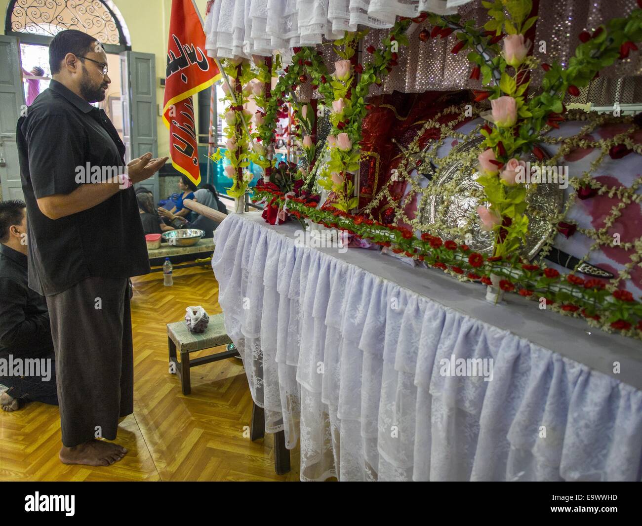 Yangon, Yangon Division, Myanmar. 3rd Nov, 2014. A man in Punja Mosque ...