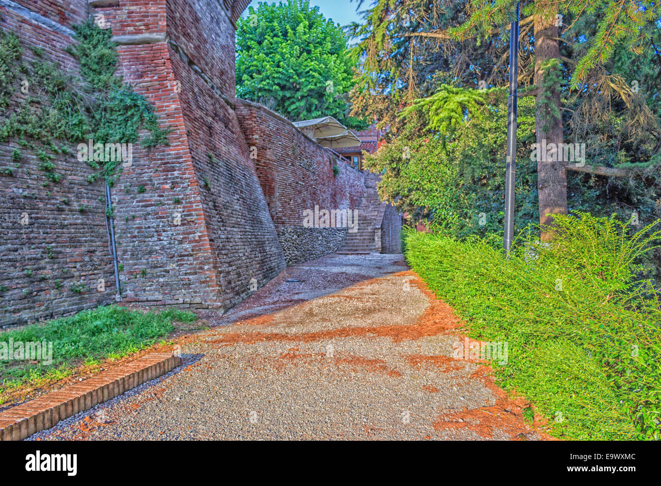 The medieval brick walls of the small village of Dozza near Bologna in ...