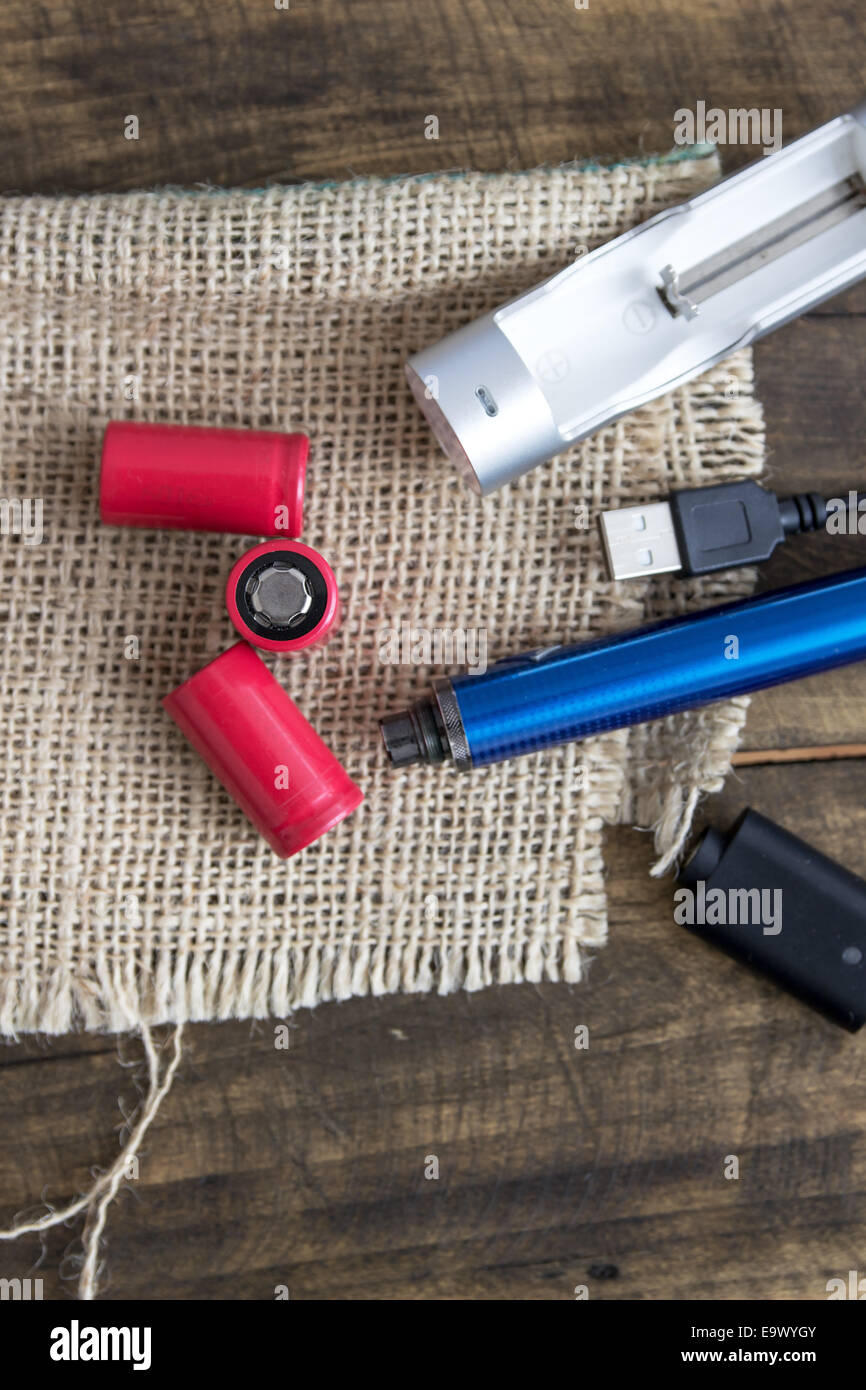 Advanced vaping device, E-cigarette equipmen on table Stock Photo - Alamy