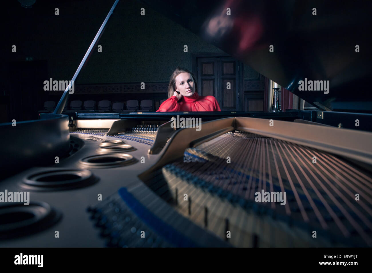 indoor portrait of a young female piano player Stock Photo - Alamy