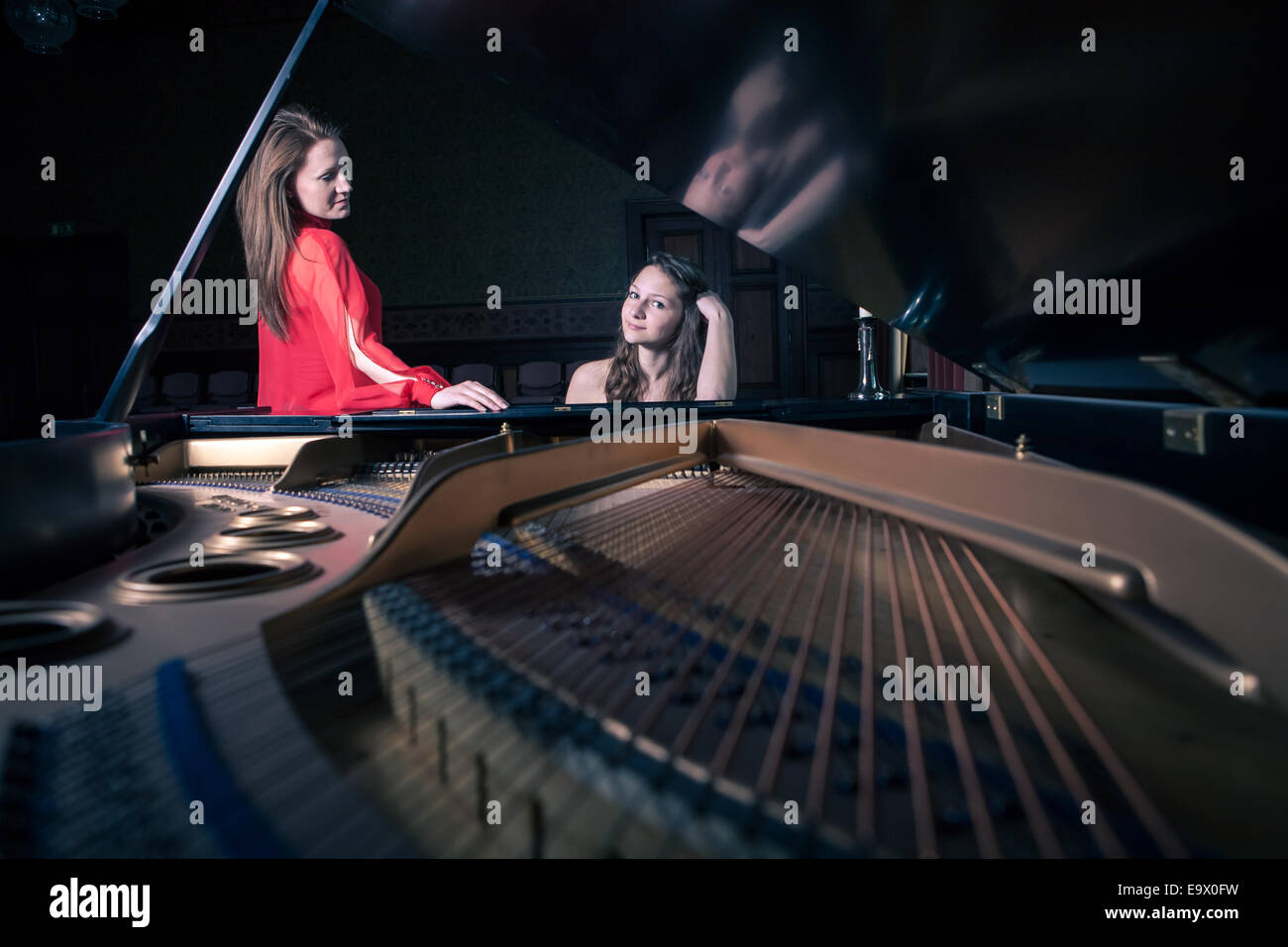 Young female piano player hi-res stock photography and images - Alamy