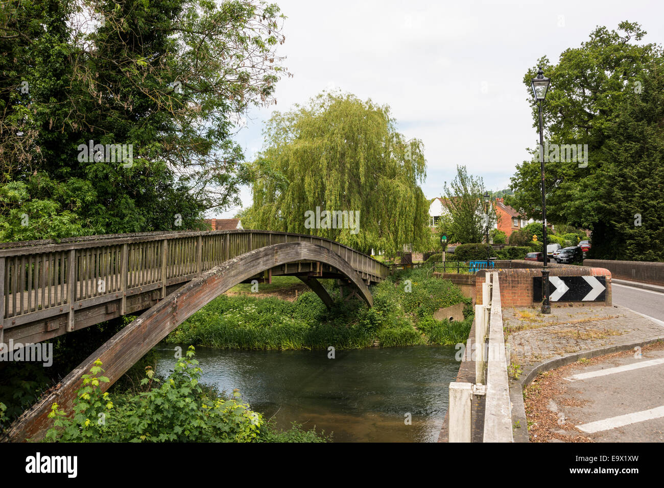 Wooden pedestrian bridge over River Mole in Brockham, Surrey, UK Stock ...